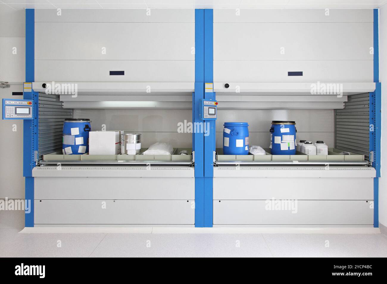 Vertical carousel space saver for storage in warehouse Stock Photo - Alamy