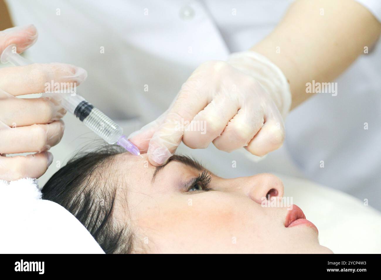 Woman Having Botox Treatment At Beauty Clinic Stock Photo - Alamy