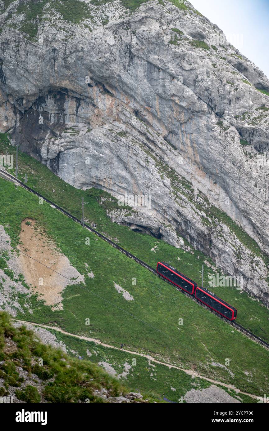 Cogwheel train climbing to the top of Mount Pilatus in Canton Lucerne ...