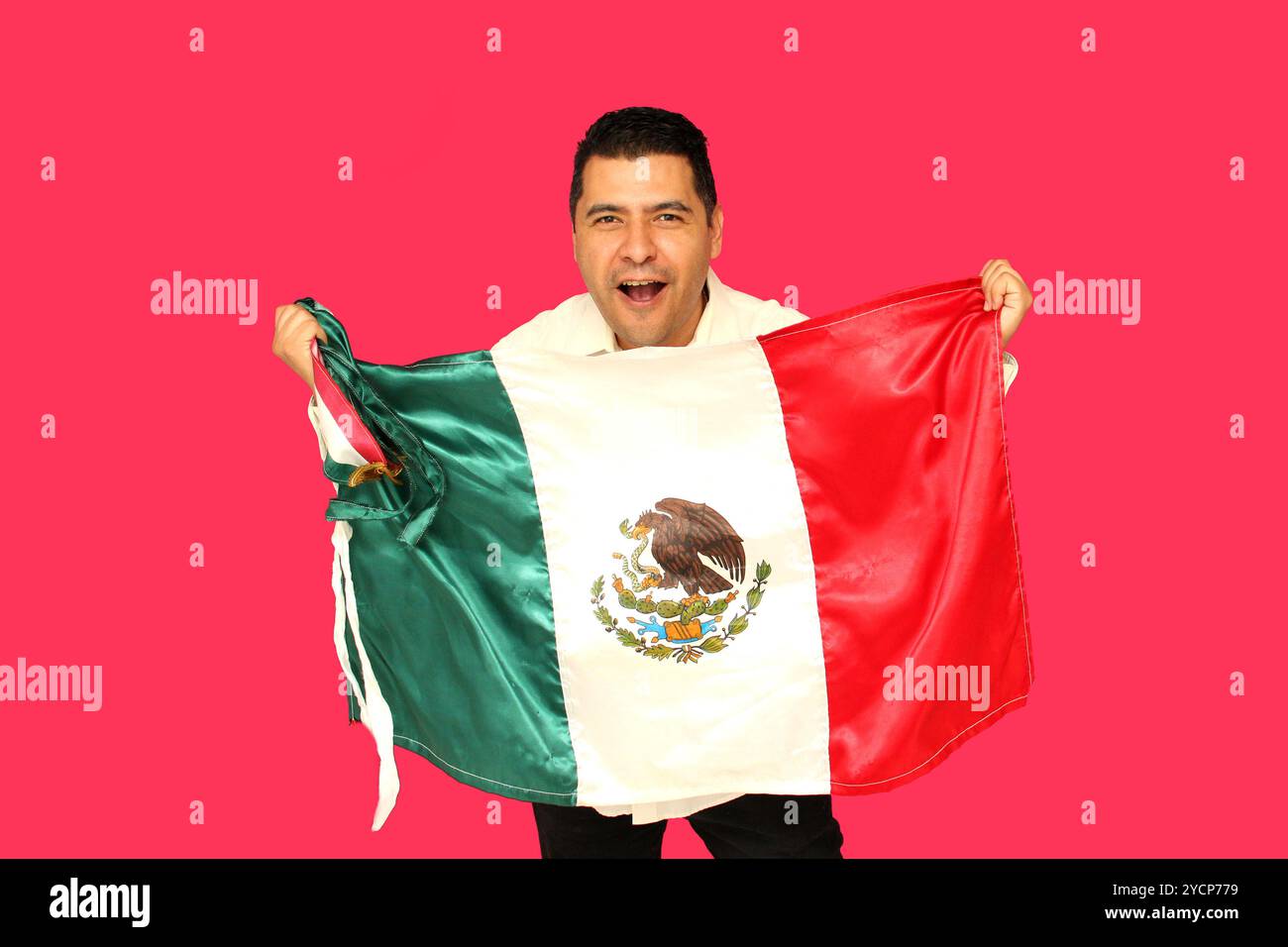 40-year-old dark-skinned Mexican man proudly shows the flag of Mexico ...