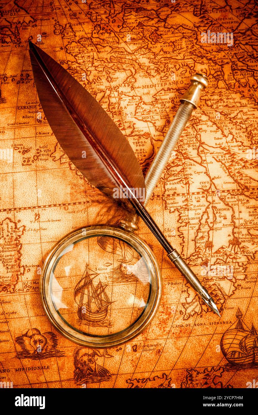 Vintage still life. Vintage items on ancient map Stock Photo - Alamy