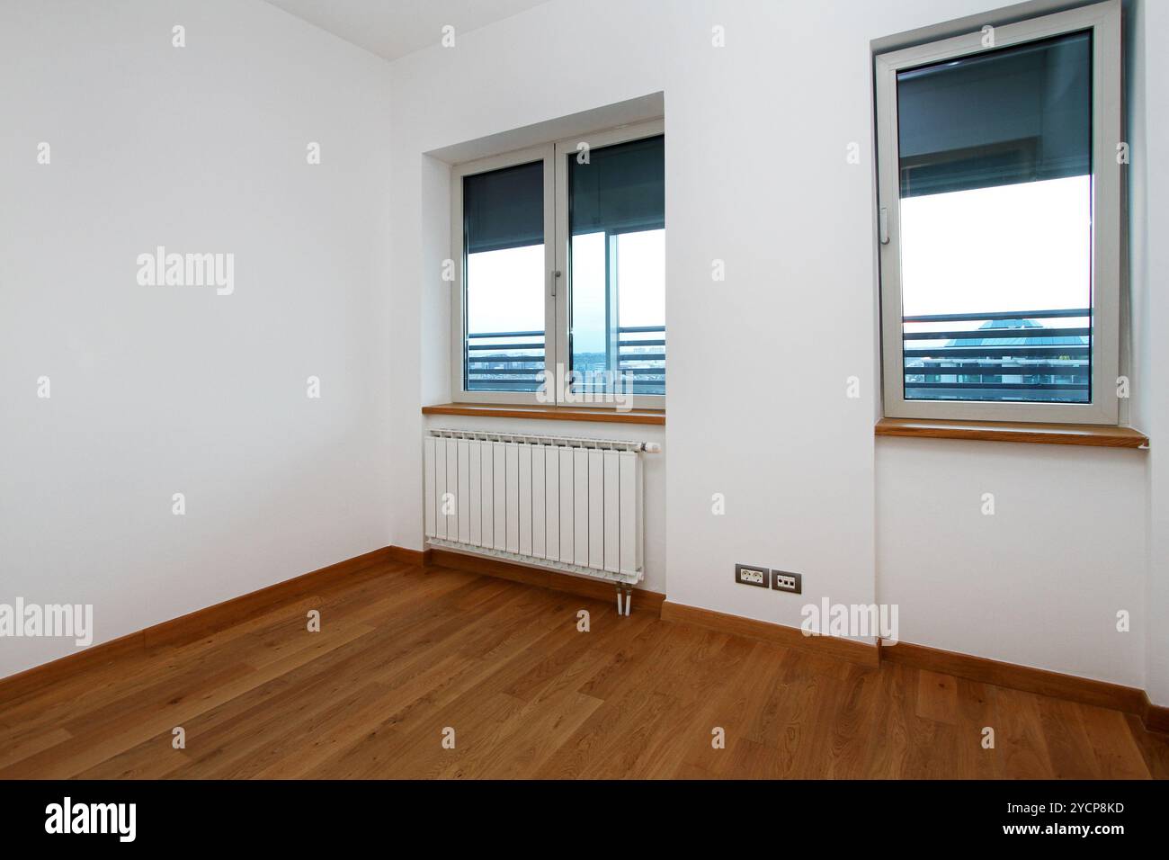 New empty small room in renovated home Stock Photo - Alamy