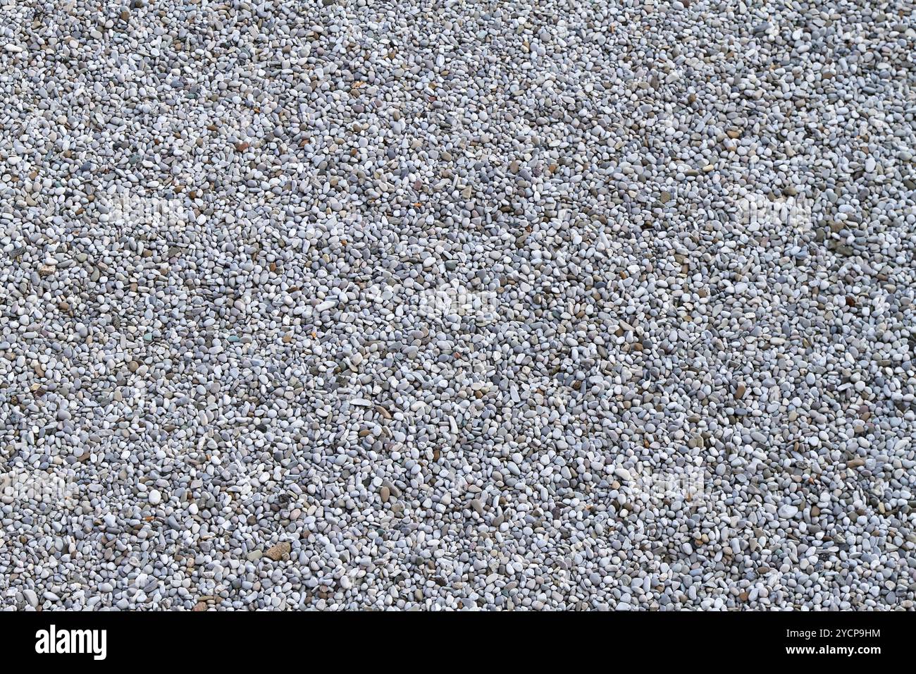 Small pebble stones texture at the beach Stock Photo - Alamy