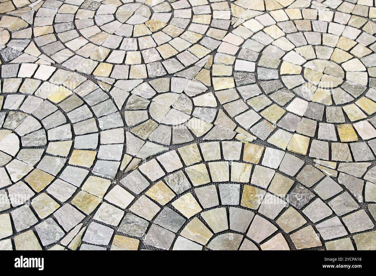 Circle pattern of new cobble stones ground Stock Photo - Alamy