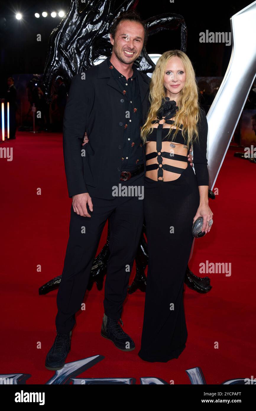 Michal Szymanski, left, and Juno Temple pose for photographers upon ...