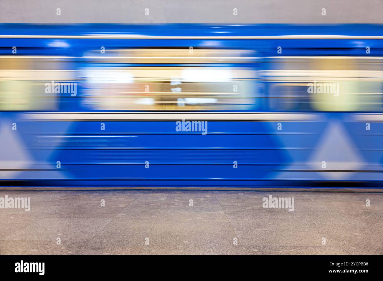Blue subway train in motion at the station Stock Photo - Alamy