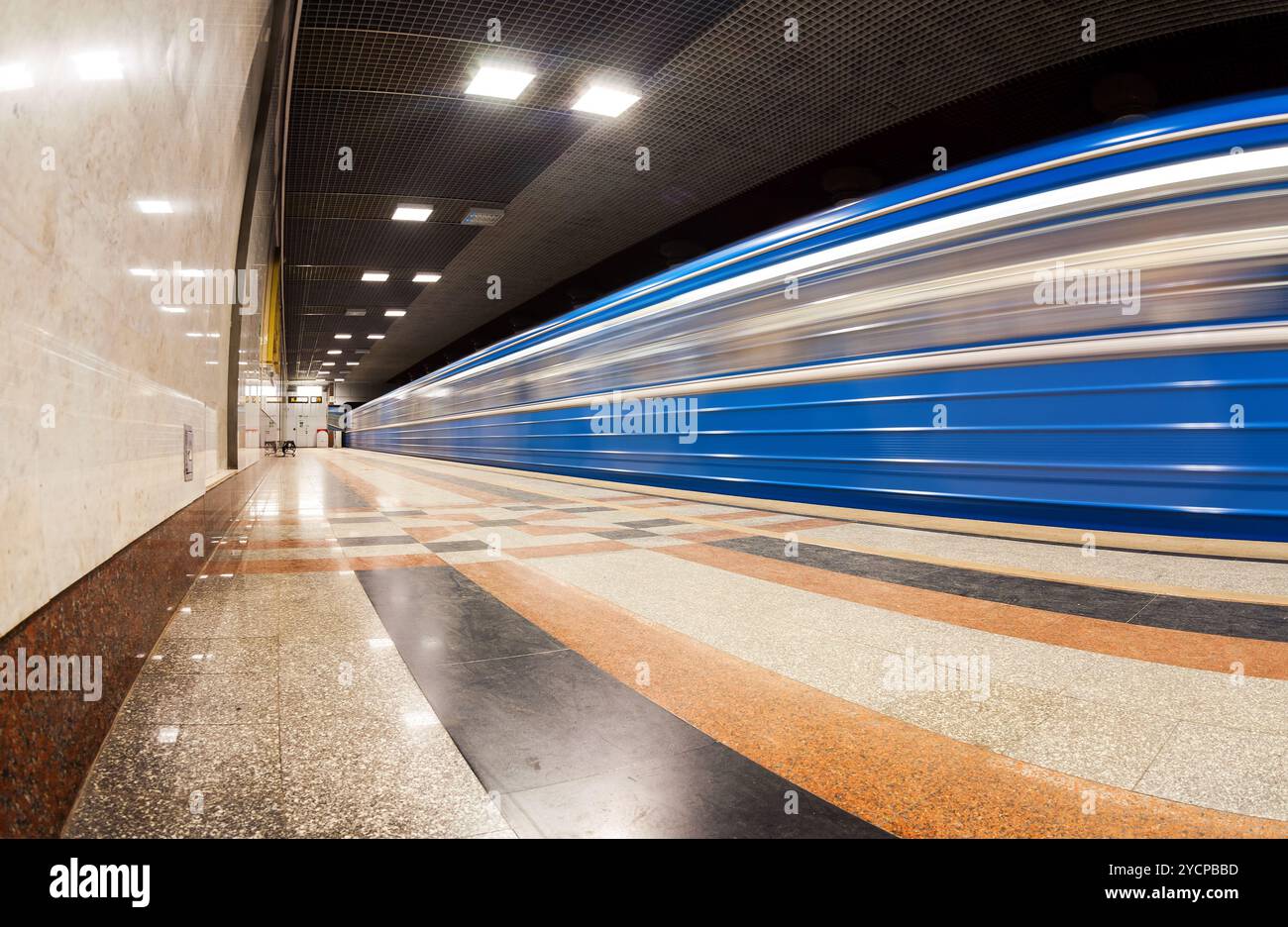 Blue subway train in motion at the station Stock Photo - Alamy