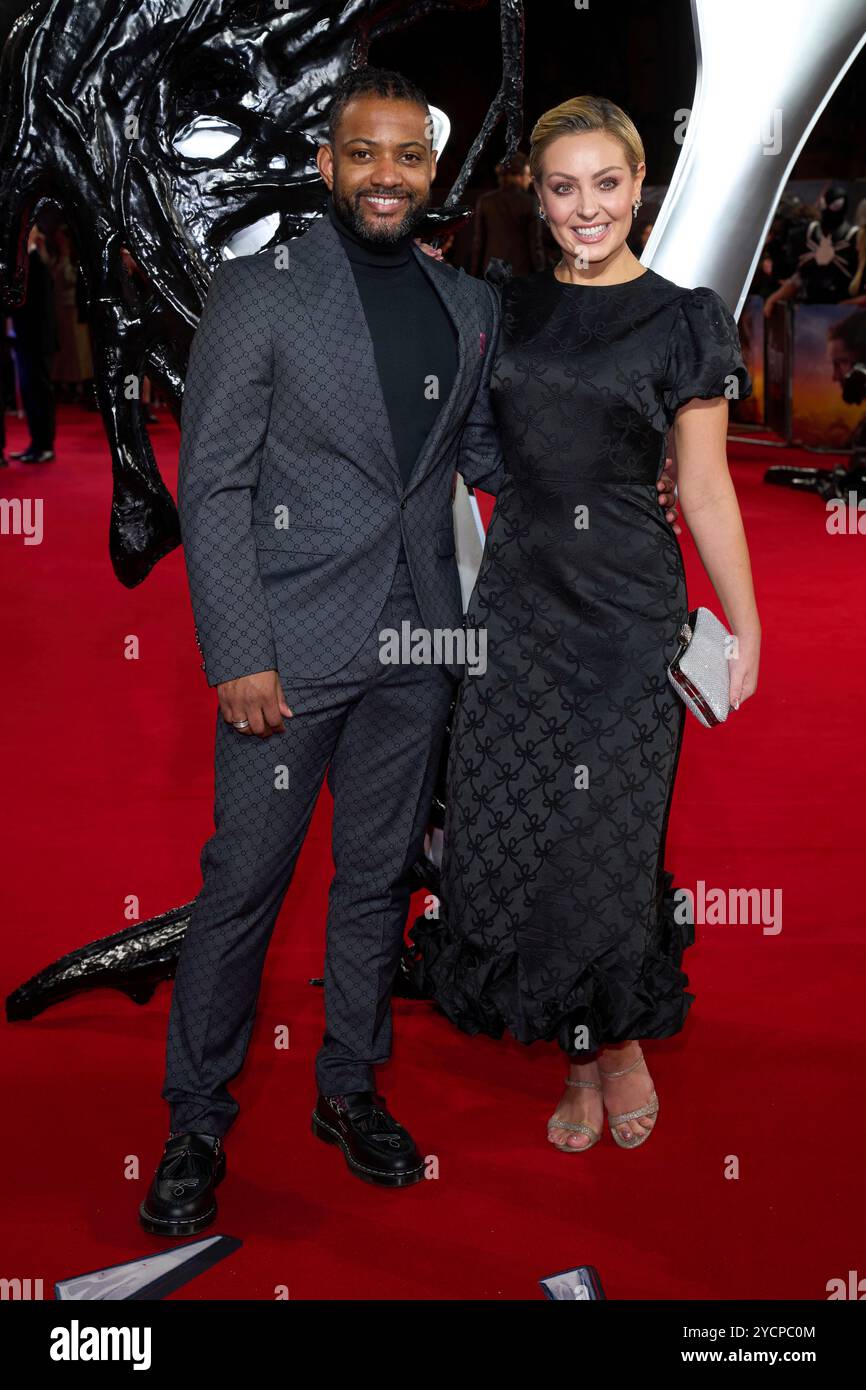 JB Gill, left, and Amy Bowden pose for photographers upon arrival at ...