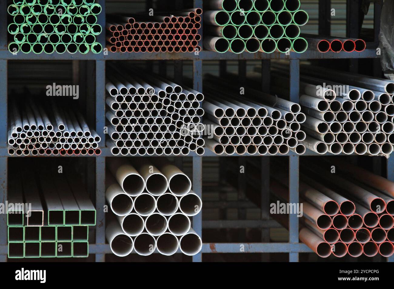 Ductile iron pipes at shelf in warehouse Stock Photo - Alamy