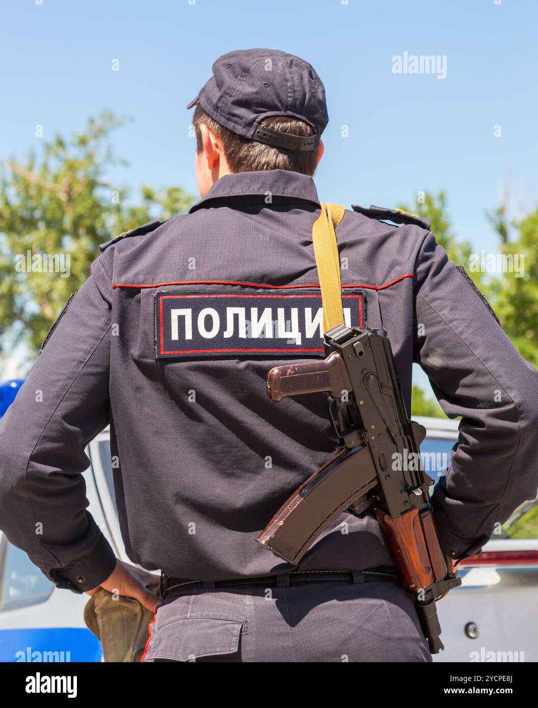 Russian policeman in uniform with automatic rifle Stock Photo - Alamy