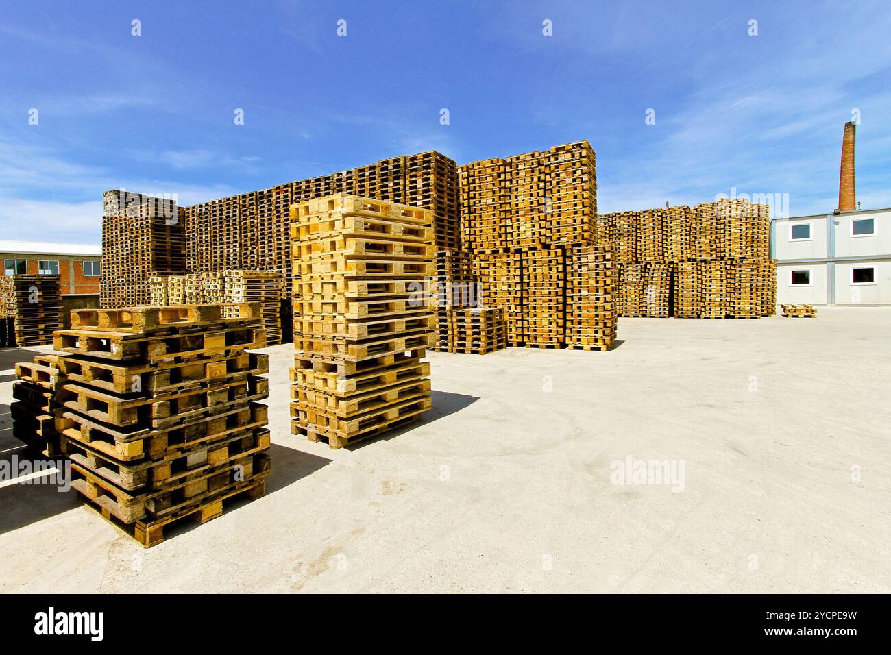 Pallets stacks for cargo and logistic at warehouse Stock Photo - Alamy