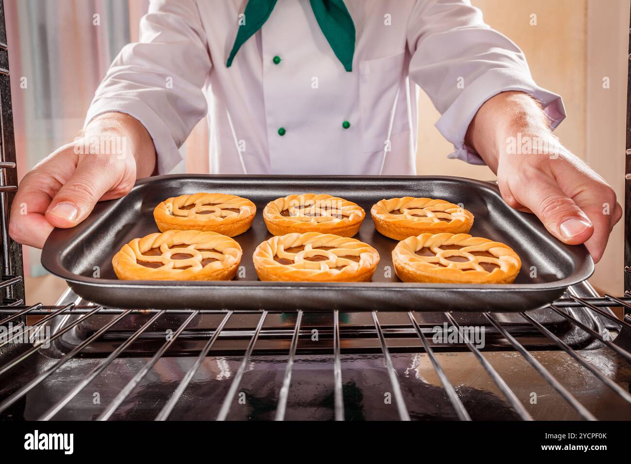 Chef cooking in the oven Stock Photo - Alamy