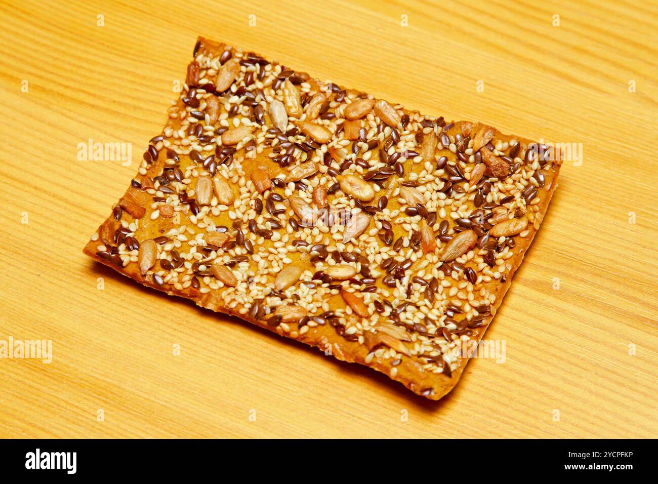 Multi seeds and whole grains thin cracker Stock Photo - Alamy