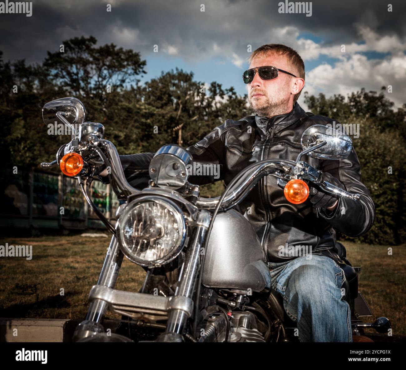 Biker on a motorcycle Stock Photo - Alamy