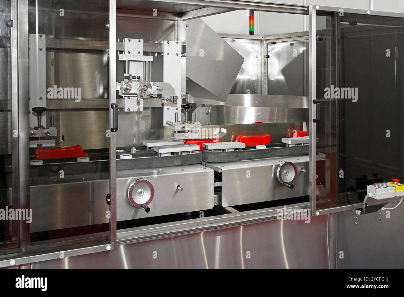 Ketchup packaging line Stock Photo - Alamy
