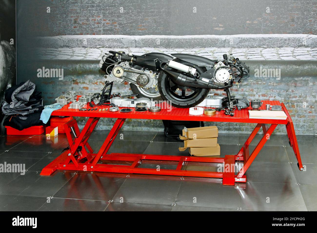 Scooter service garage Stock Photo - Alamy