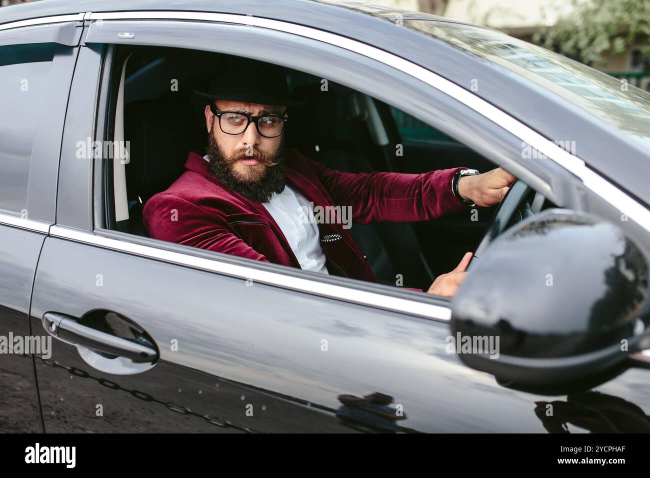 Man posing luxury car hi-res stock photography and images - Alamy