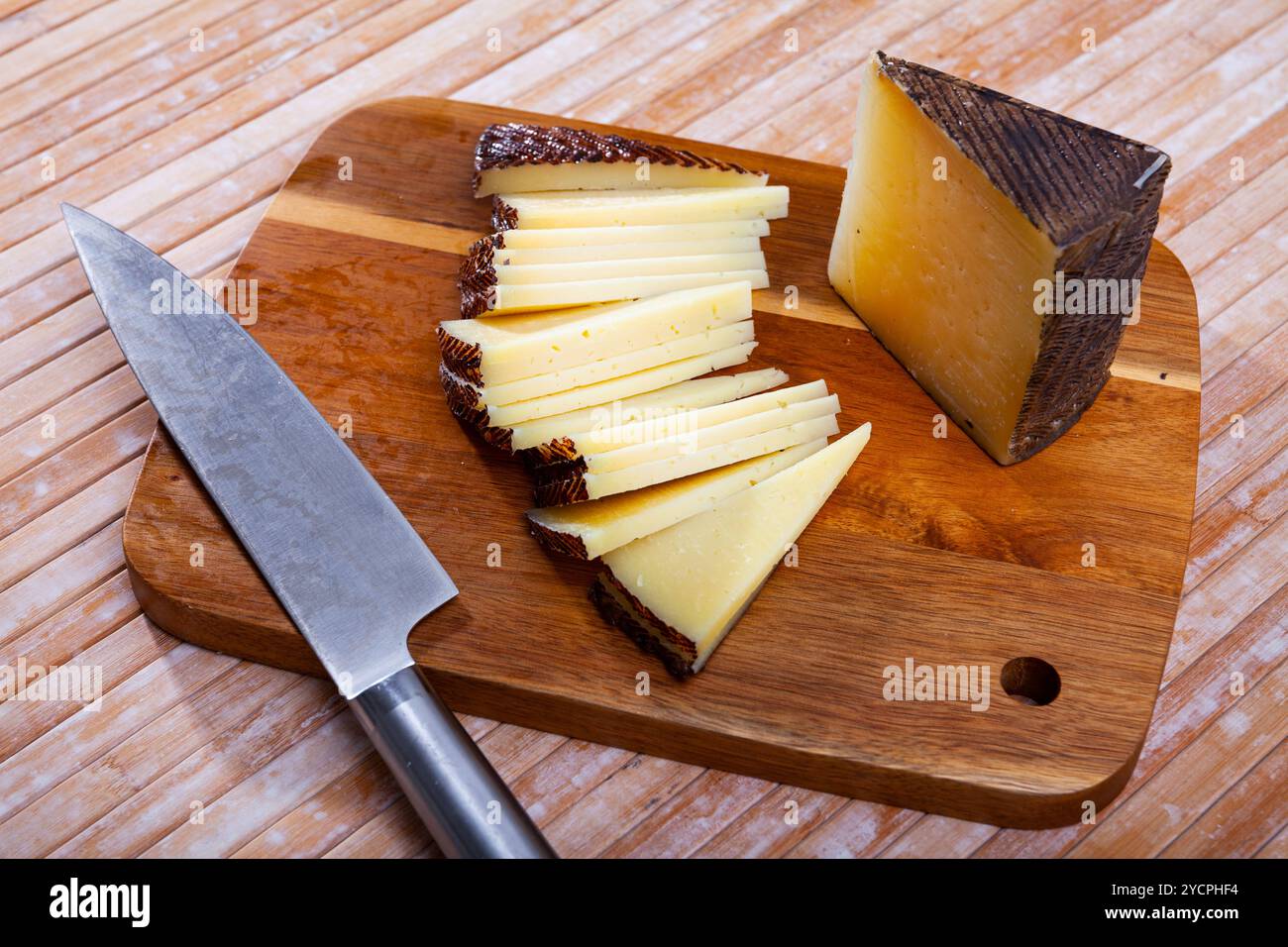 Sliced italian cured sheep cheese Pecorino Stock Photo - Alamy