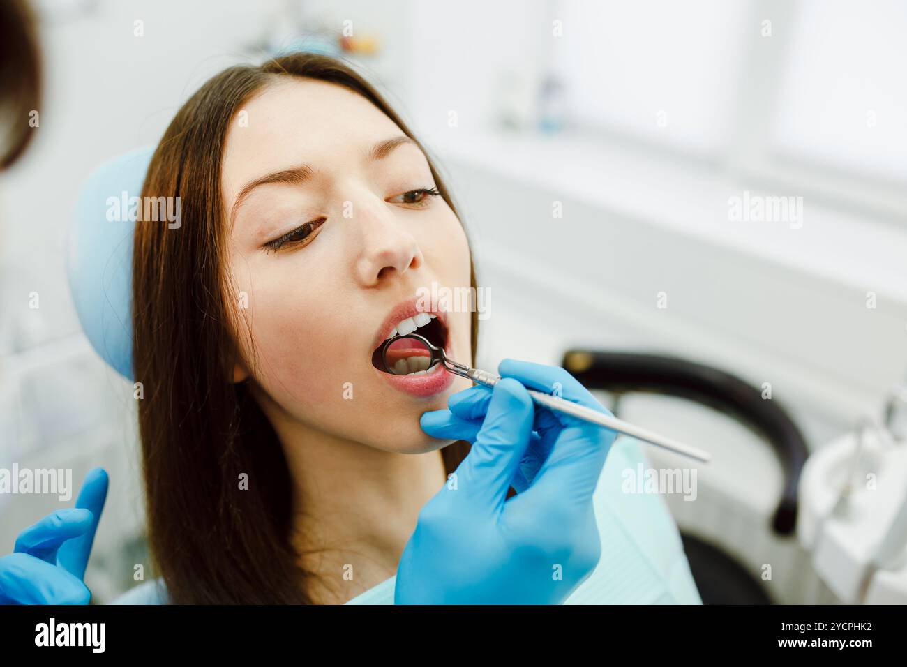 Inspection teeth the girl Stock Photo - Alamy