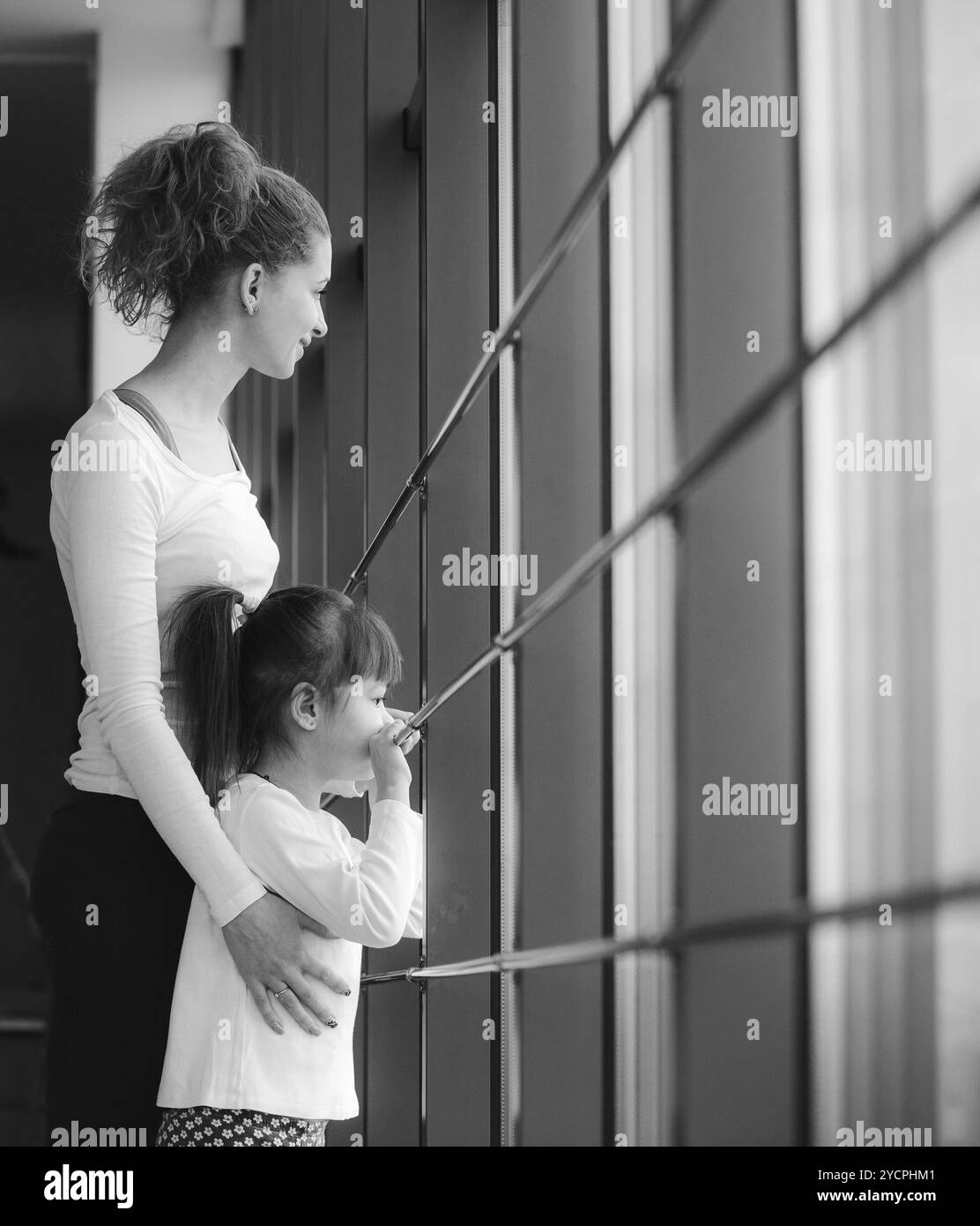 Charming family spends time in the gym Stock Photo - Alamy Charming family spends time in the gym Stock Photo - Alamy