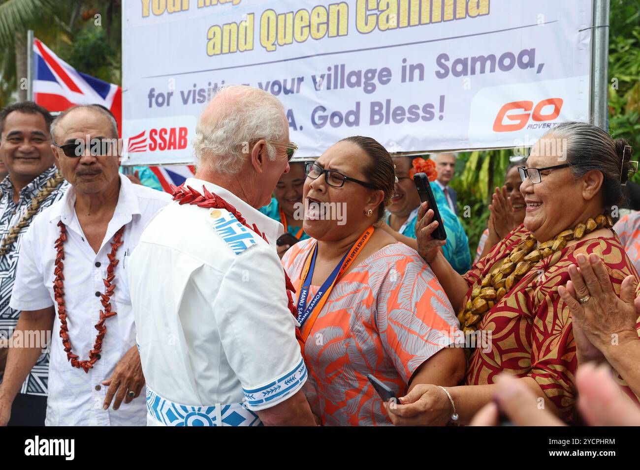 King Charles III talks with resident Faamanatu Molly Nielsen during a ...
