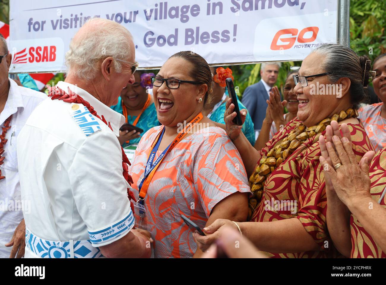 King Charles III talks with resident Faamanatu Molly Nielsen during a ...