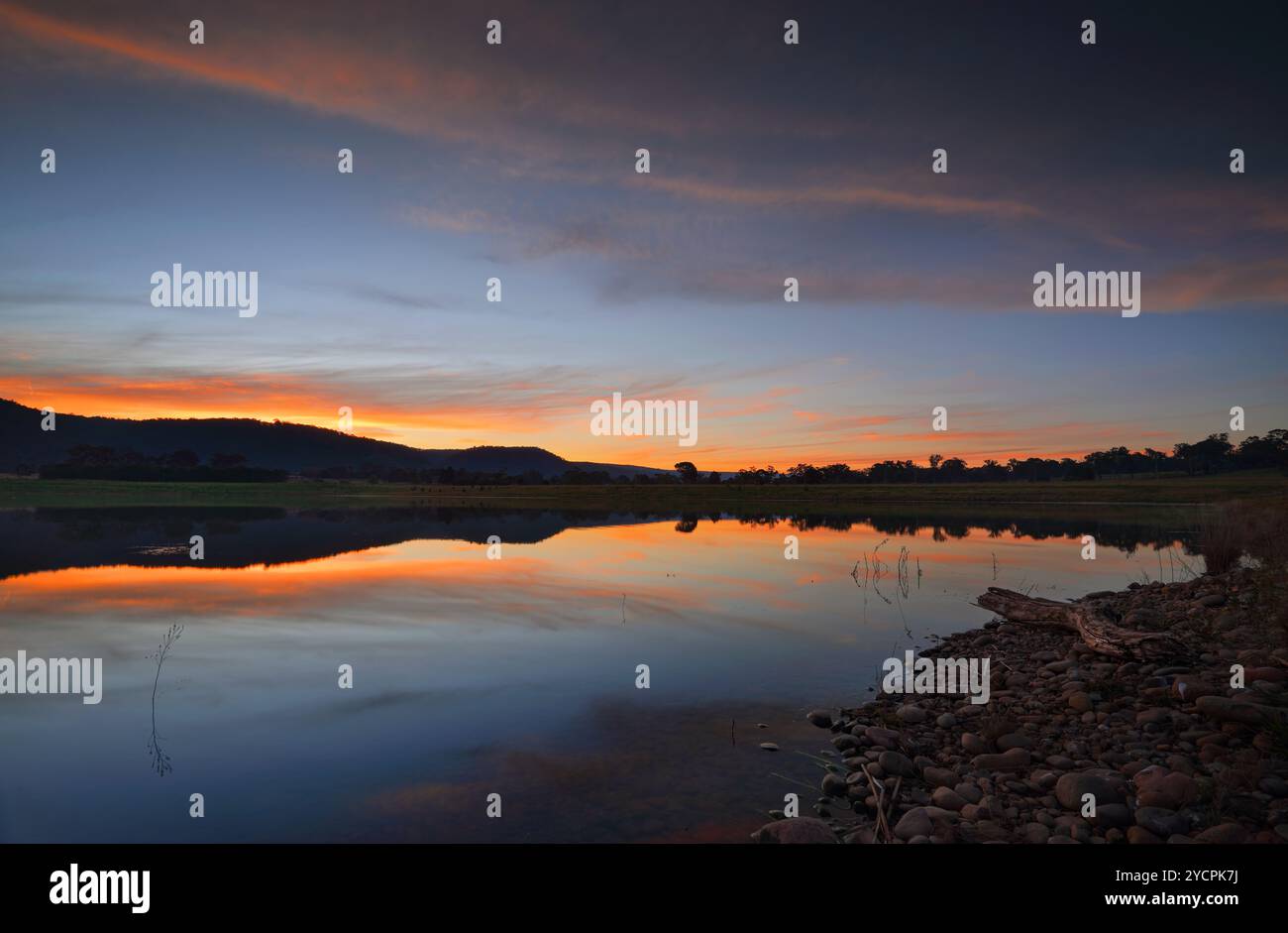 Sunset skies over Boorooberongal Lake in Penrith Castlereagh with Blue ...
