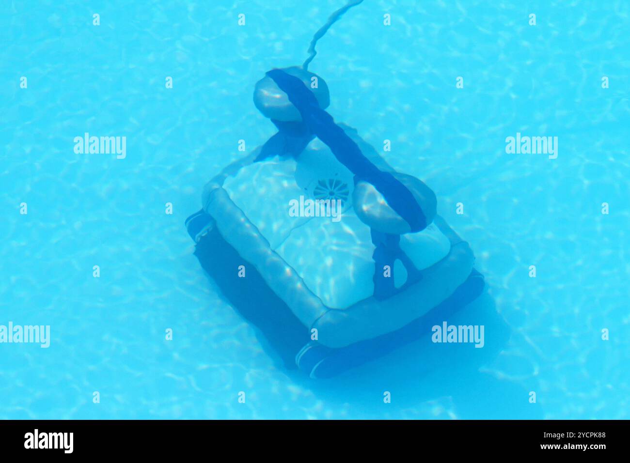 Automatic robot cleaner underwater in swimming pool Stock Photo - Alamy