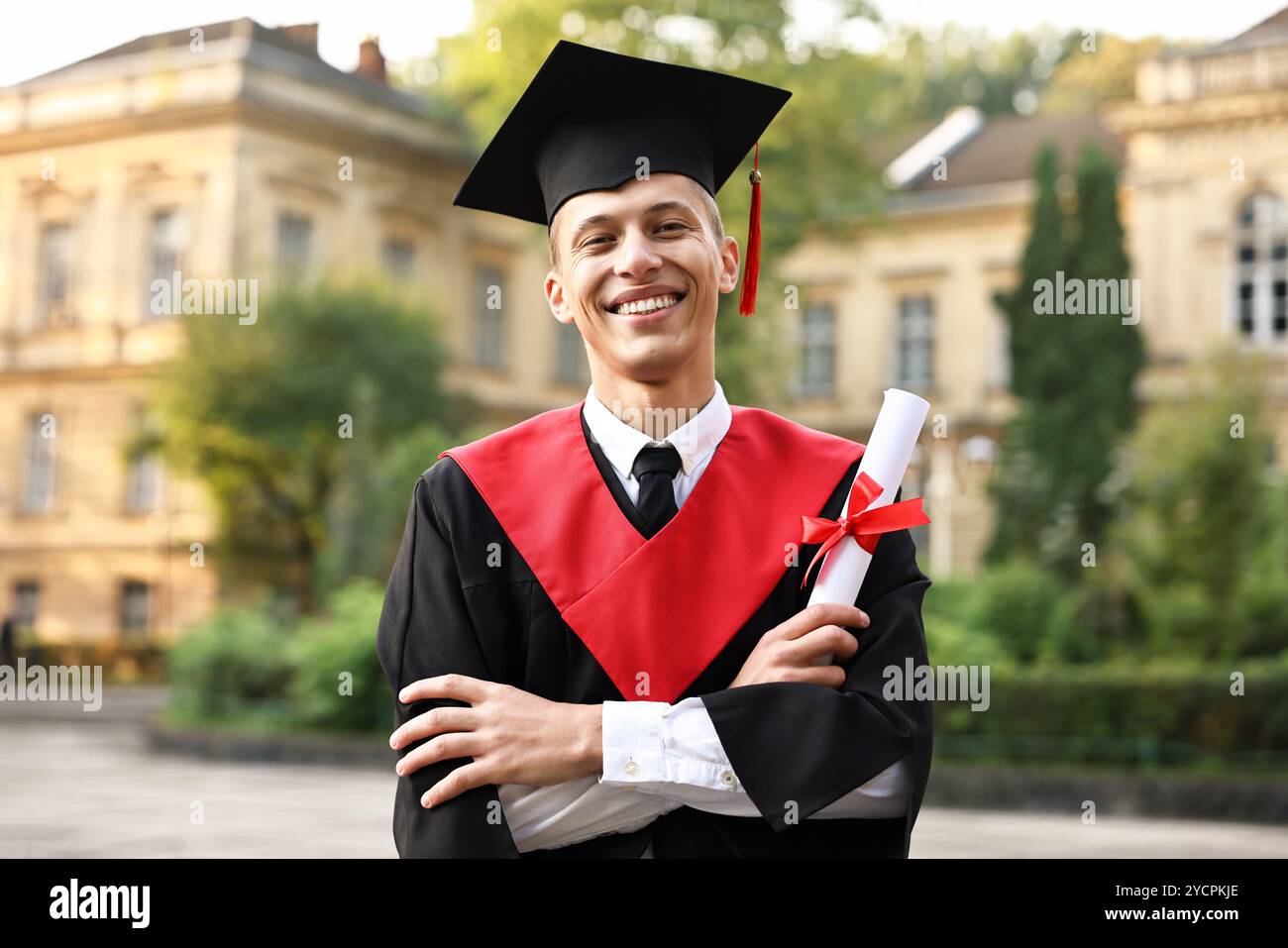 Happy student with diploma after graduation ceremony outdoors Stock ...