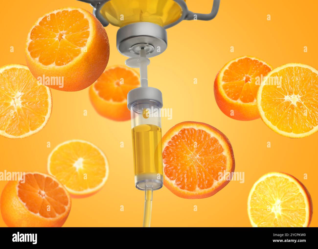 Vitamin intravenous therapy. IV infusion set and falling oranges on ...