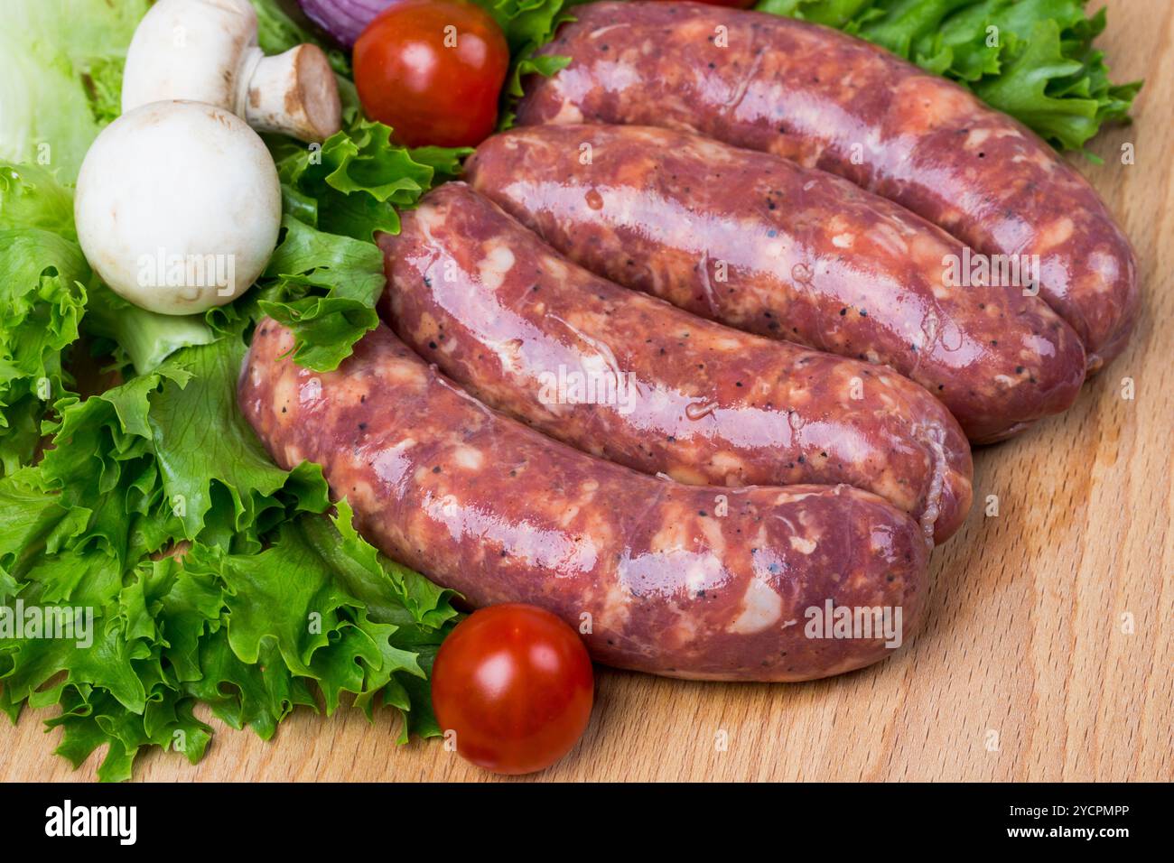 Red uncooked sausages hi-res stock photography and images - Alamy