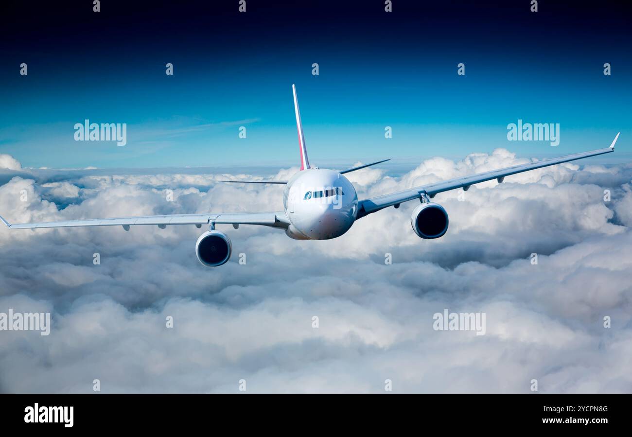 Passenger Airliner in the sky Stock Photo - Alamy