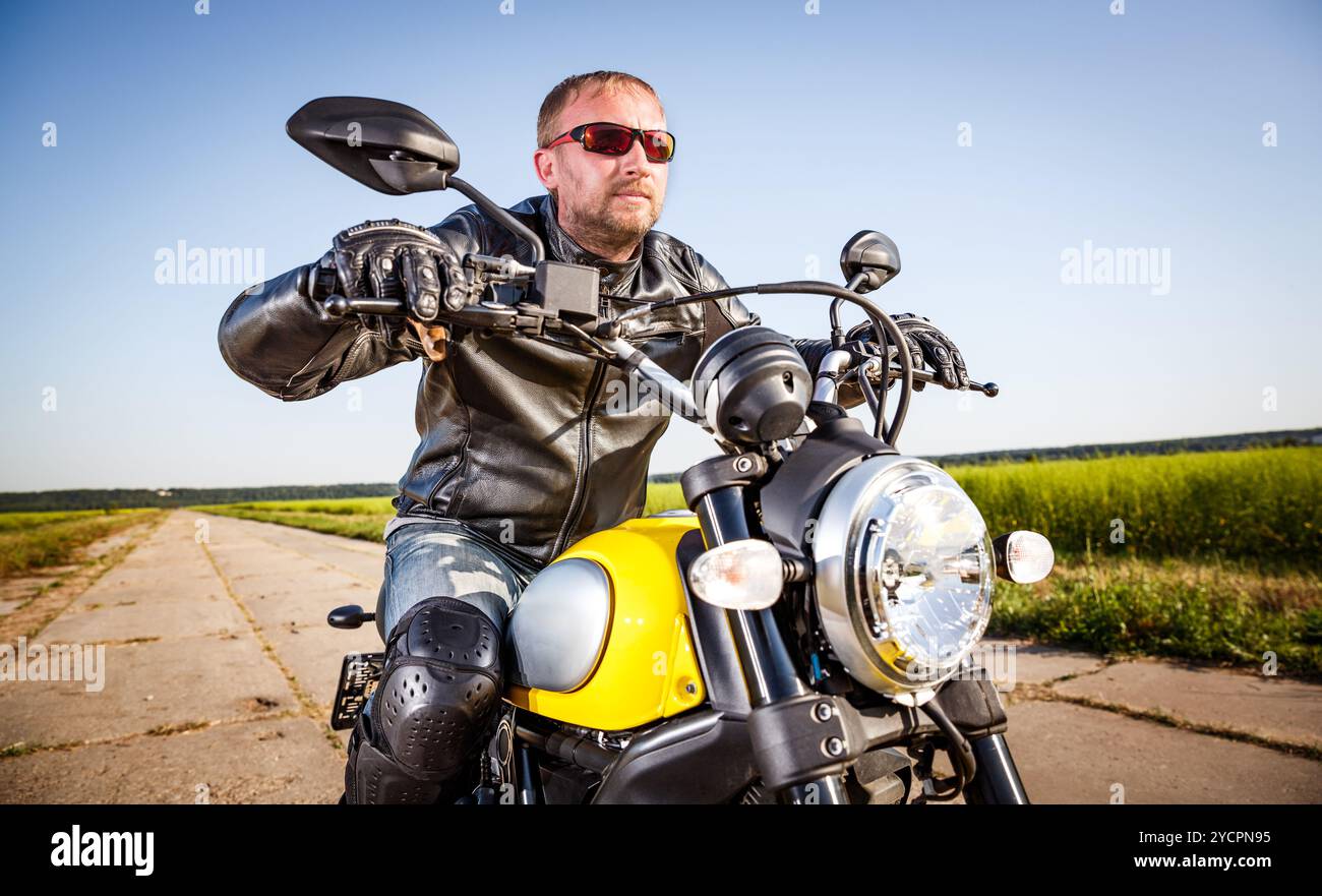 Biker on a motorcycle Stock Photo - Alamy