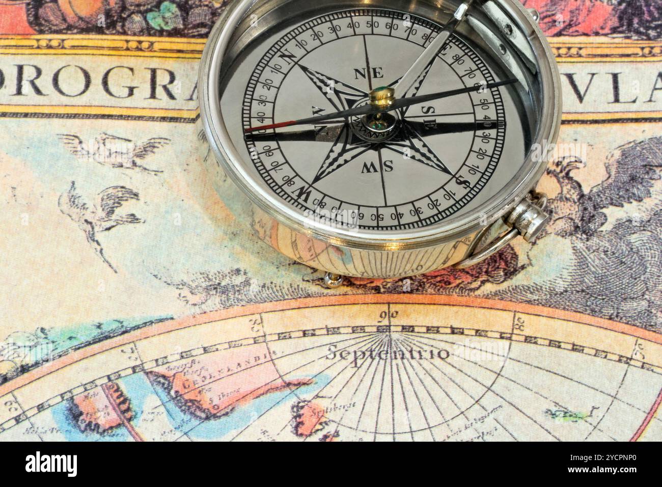 Compass on map Stock Photo - Alamy