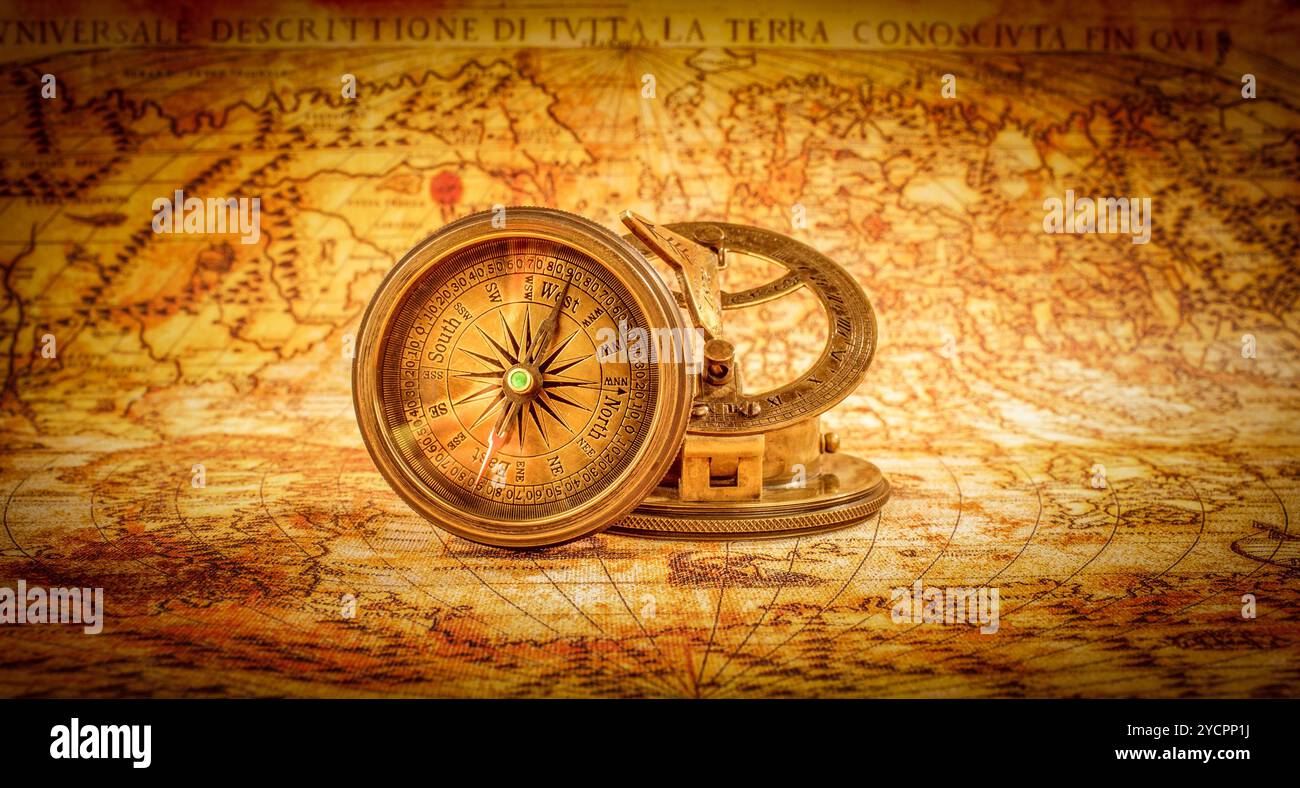 Vintage compass lies on an ancient world map Stock Photo - Alamy