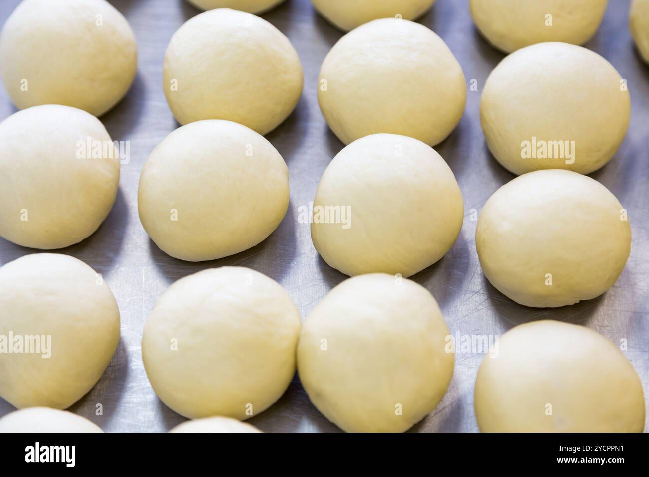 Equal uncooked pastry half-finished Stock Photo - Alamy