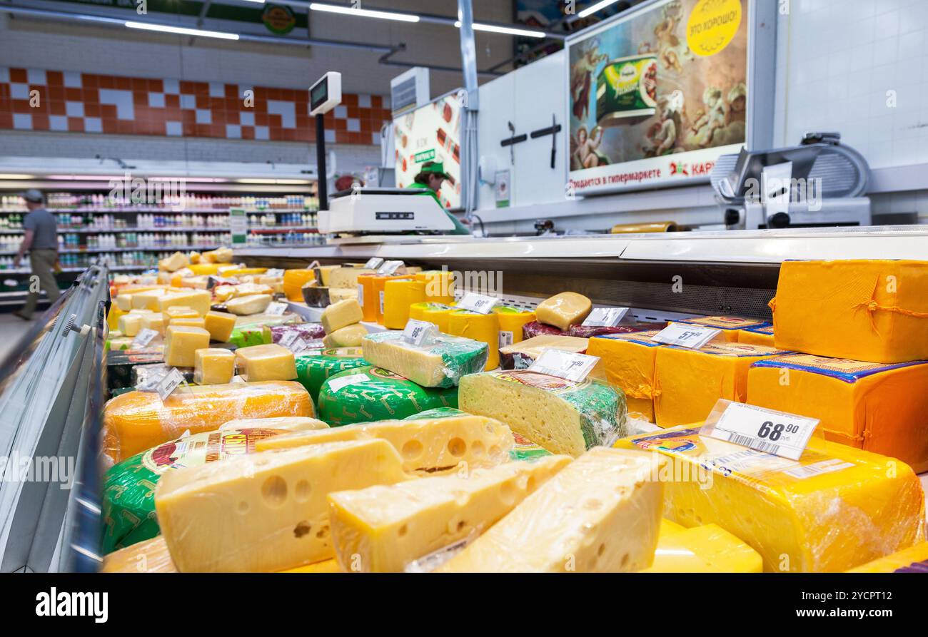 Sale of cheese in the hypermarket Karusel. One of largest retailer in ...