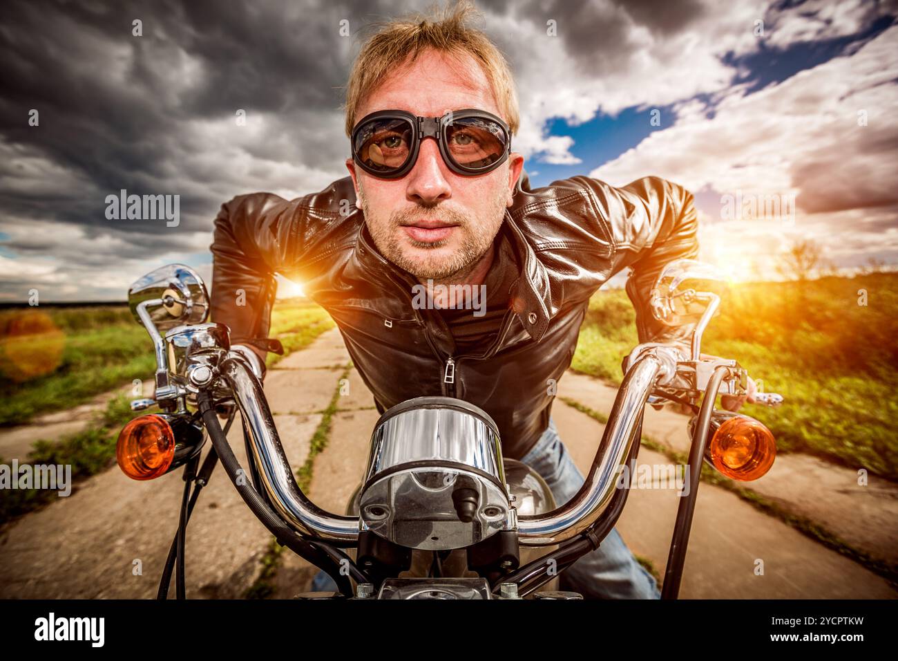 Biker on a motorcycle Stock Photo - Alamy
