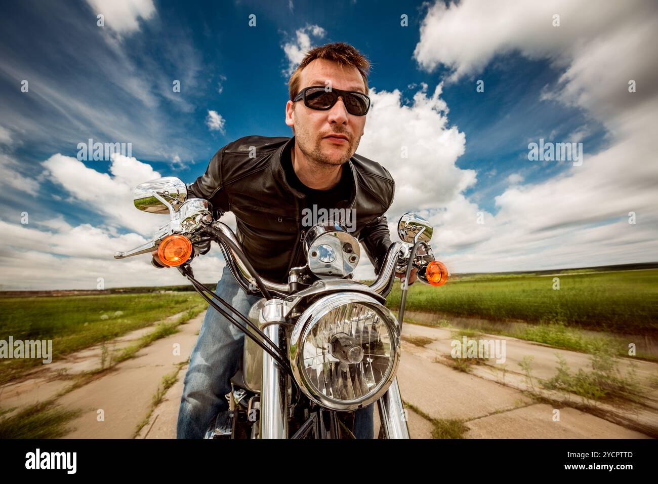 Biker on a motorcycle Stock Photo - Alamy