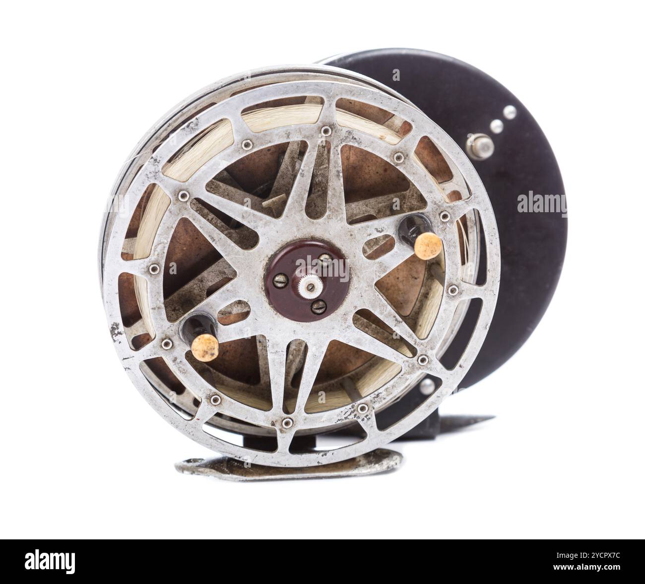 Vintage fishing reel on white background Stock Photo - Alamy