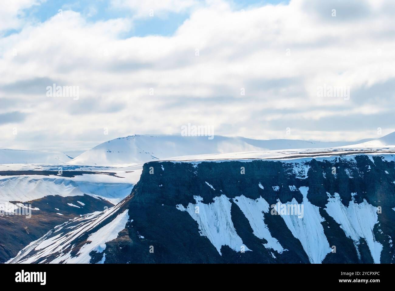 View over snowy mountains in Svalbard, Arctic Stock Photo - Alamy