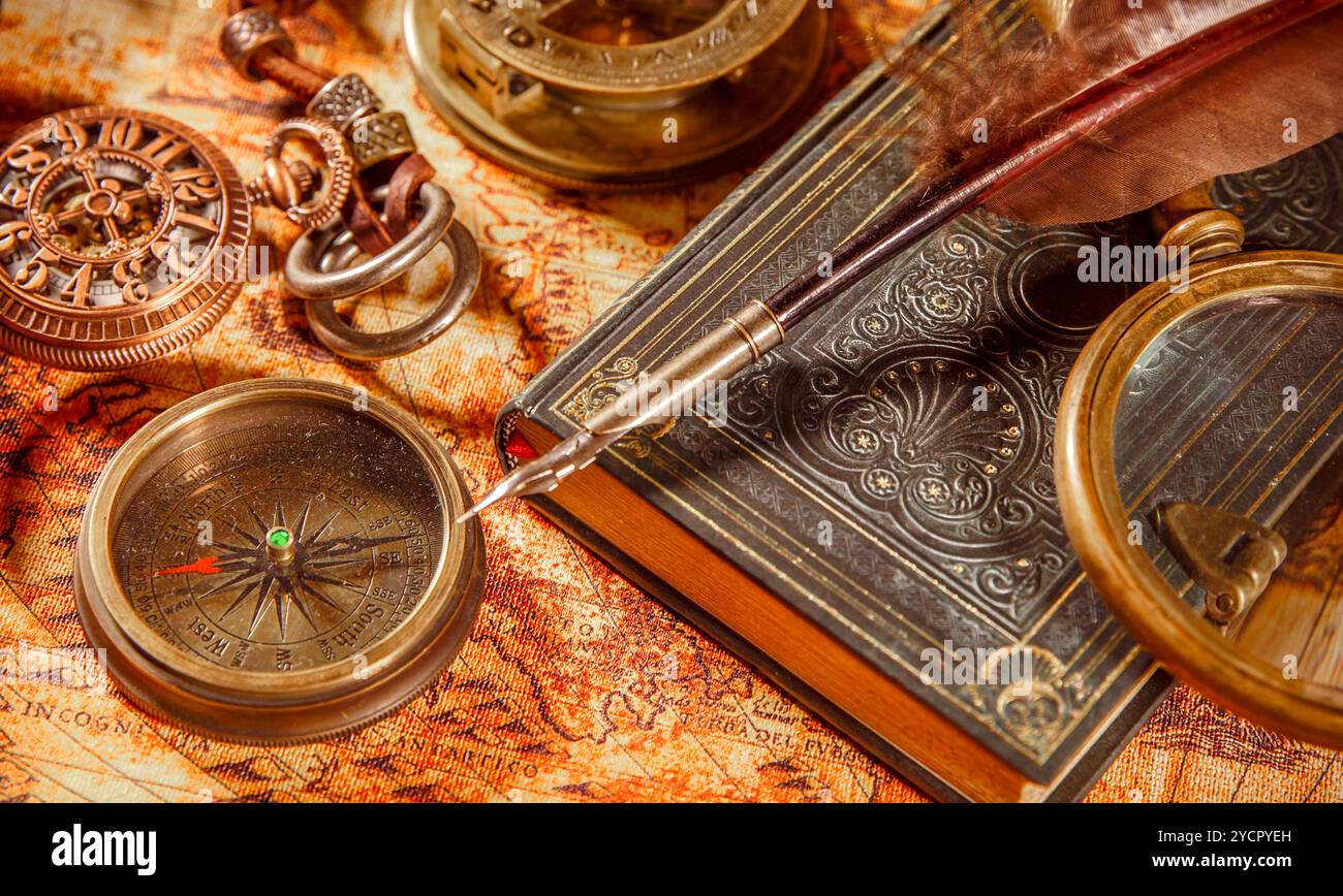 Vintage magnifying glass lies on an ancient world map Stock Photo - Alamy