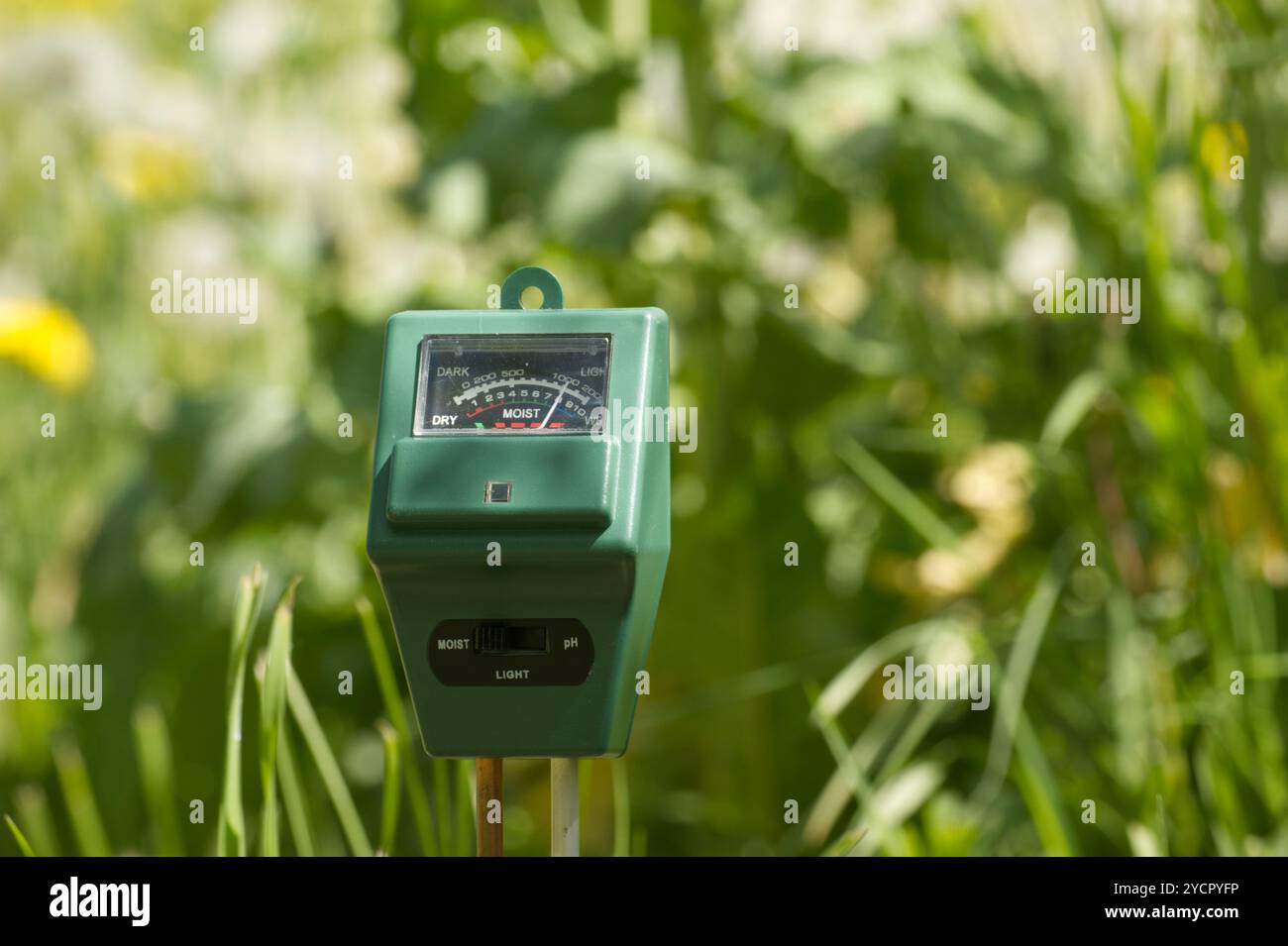 Agricultural meter in close up over blurred background. High technology agriculture concept ...