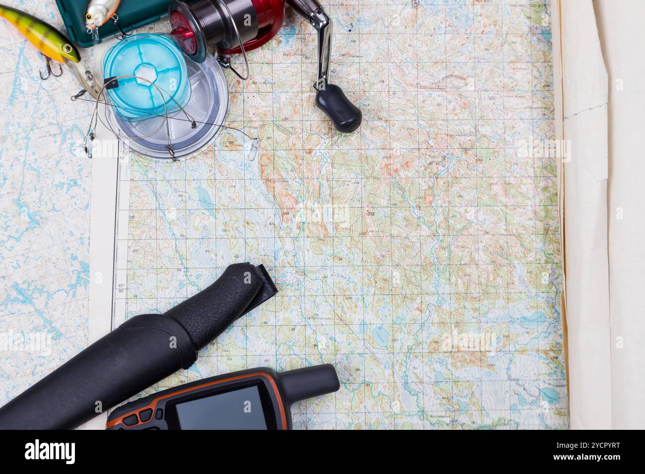 preparation in fishing journey with fishing tackles and gps navigator ...