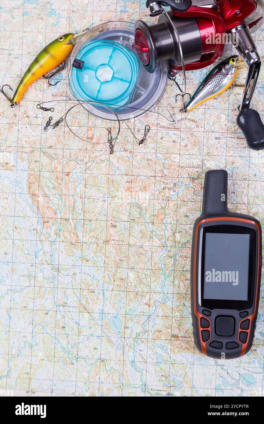 preparation in fishing journey with fishing tackles and gps navigator ...