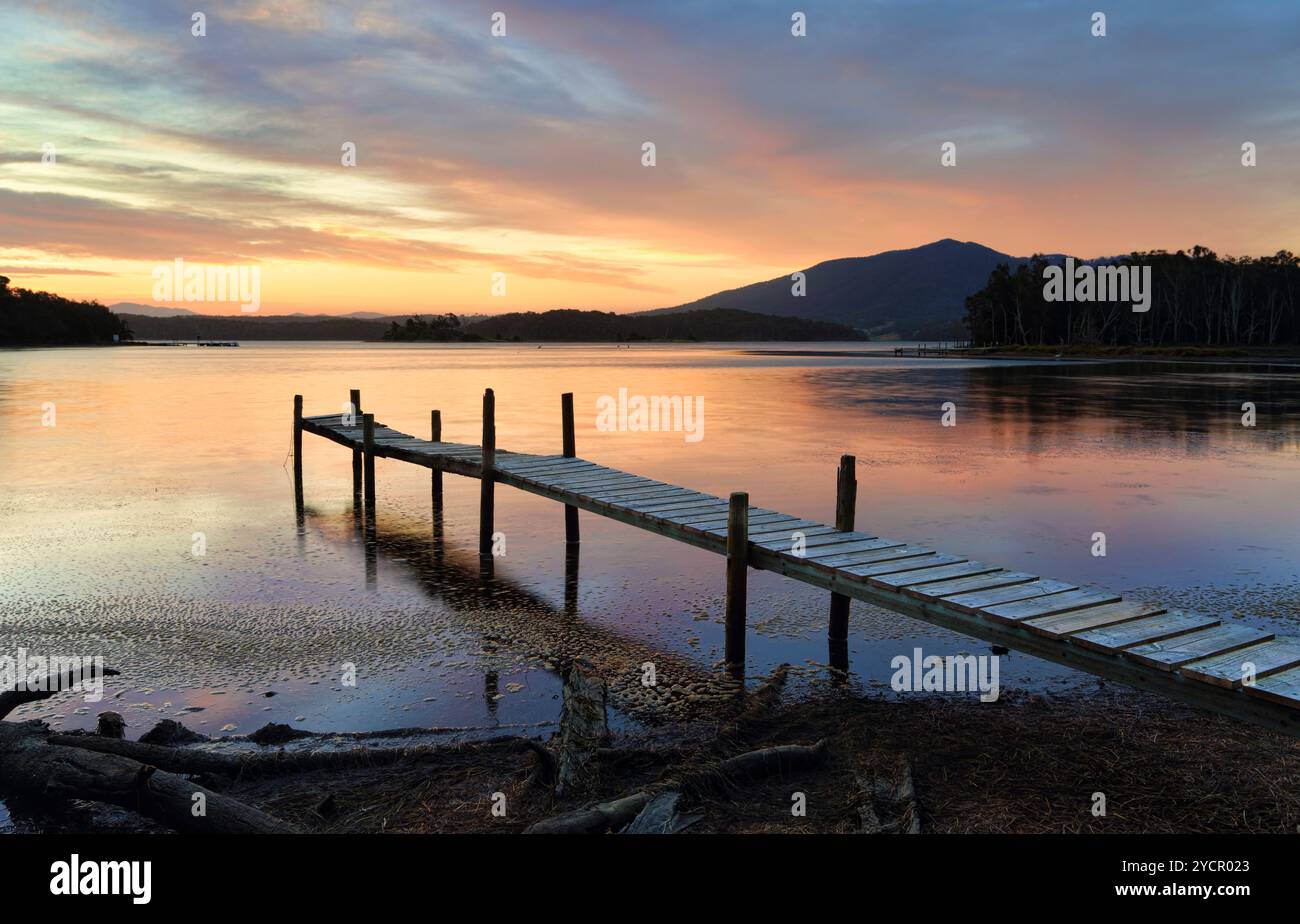 Little Timber Jetty on Wallaga Lake at Sunset Stock Photo - Alamy