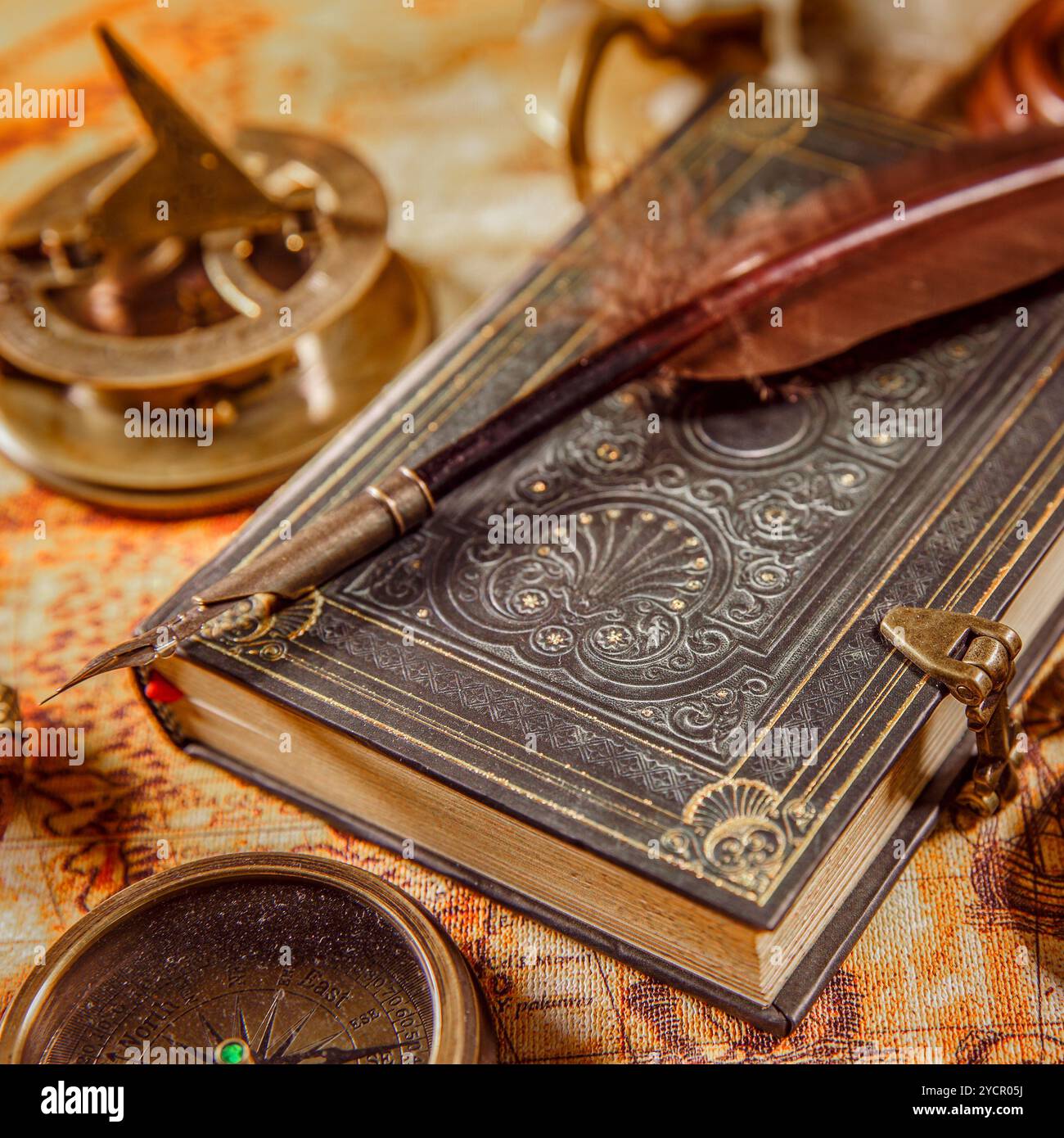 Vintage magnifying glass lies on an ancient world map Stock Photo - Alamy