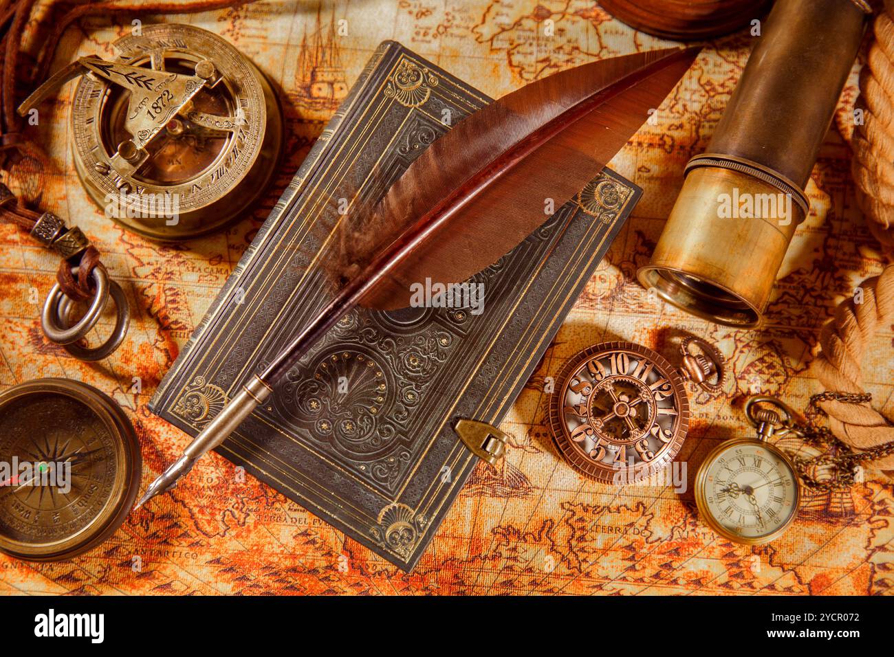 Vintage magnifying glass lies on an ancient world map Stock Photo - Alamy