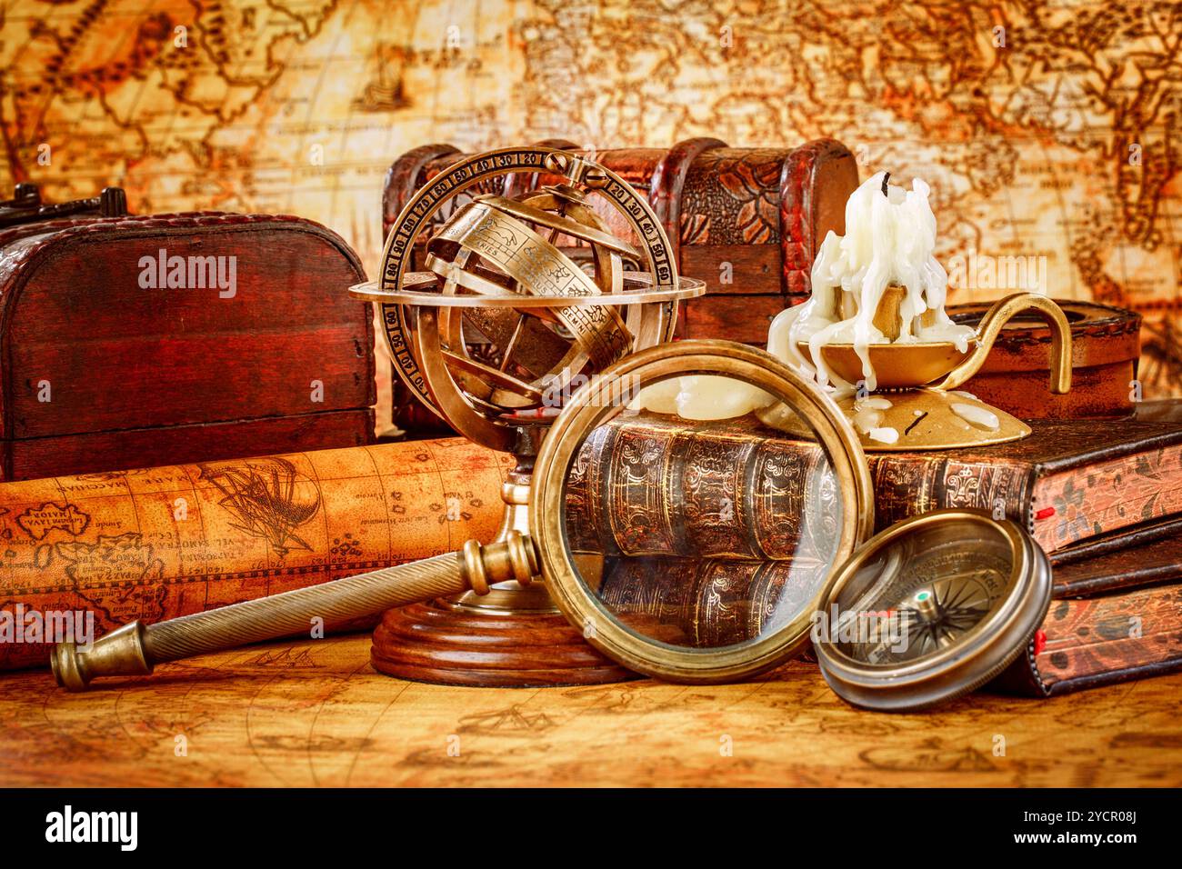 Vintage magnifying glass lies on an ancient world map Stock Photo - Alamy
