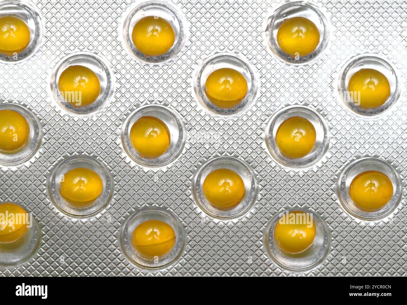 Yellow pharmaceutical medicine capsules hi-res stock photography and ...
